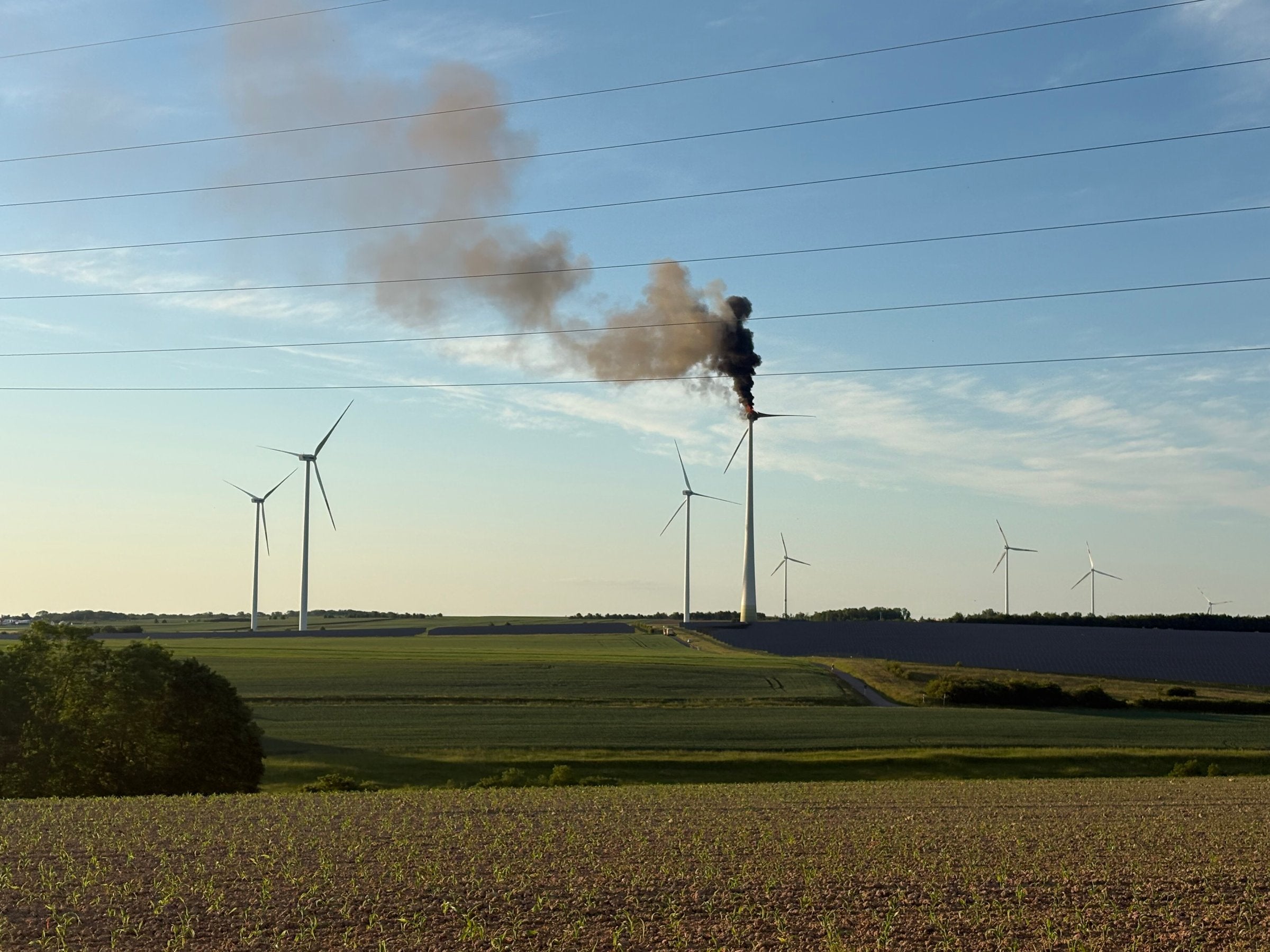 Police warn of deadly debris risk as wind turbine burns near German ...