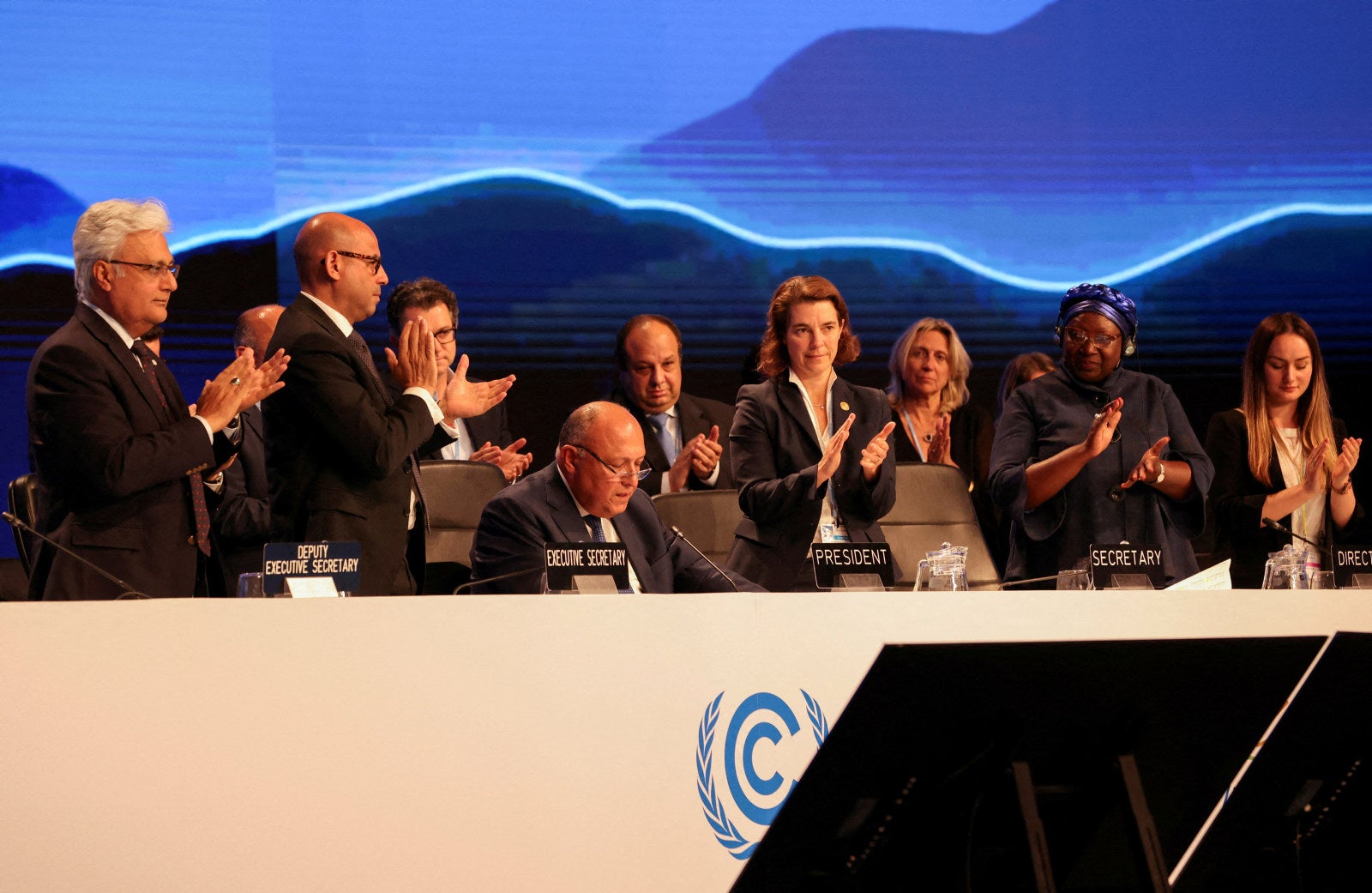 COP27 reaches key deal on "loss and damage" funds for nations ...